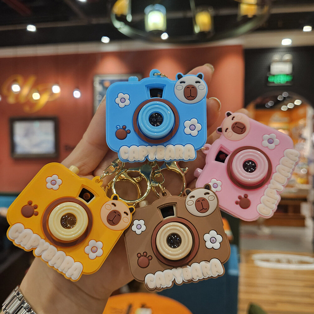 Милый мини-проектор Sanrio Kuromi в виде светящейся мультяшной проекторной камеры, брелок для женской сумки.