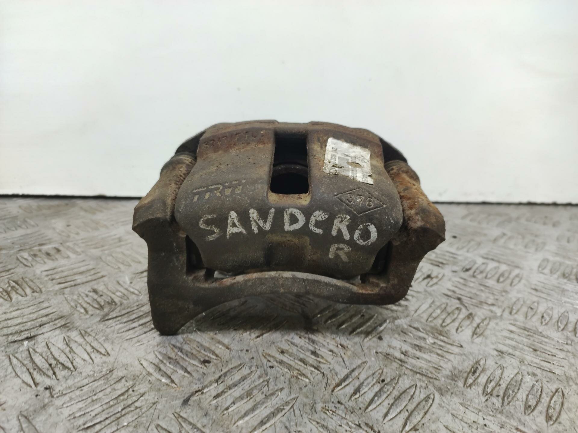 Суппорт тормозной передний правый Renault Sandero (2009 - 2014)