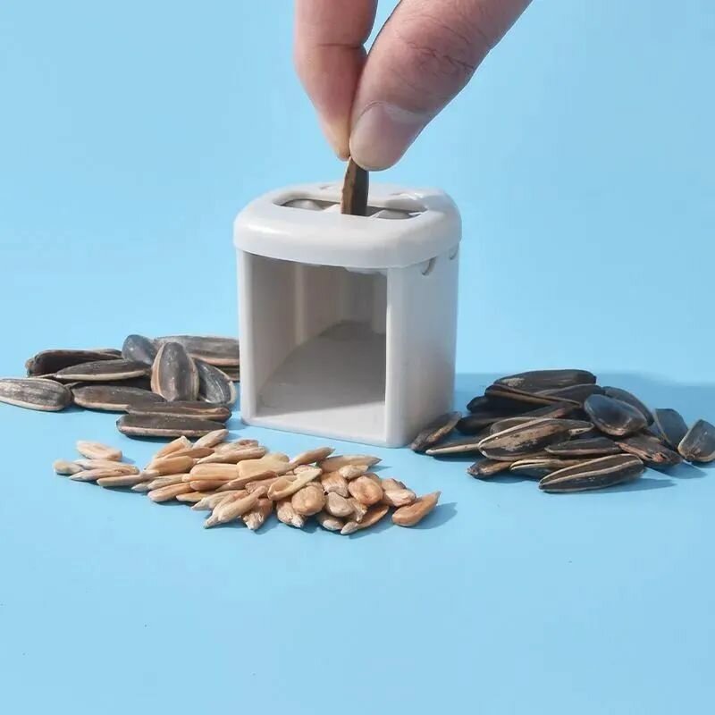 Ручная машинка для очищения семечек