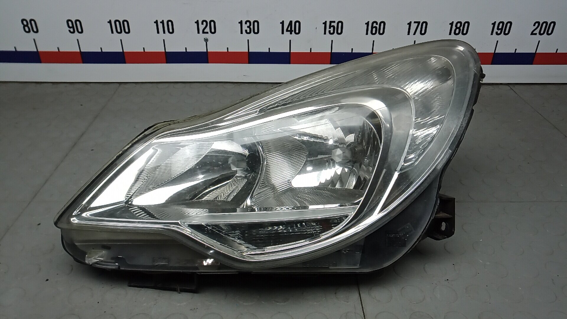 Фара левая OPEL CORSA D