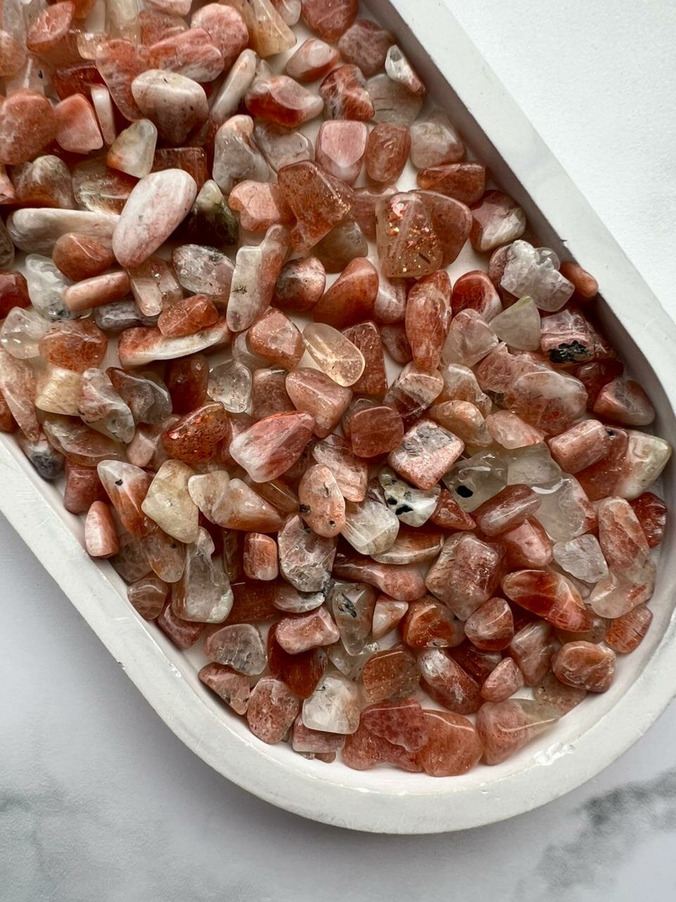 Галтовка натуральный Солнечный камень, фракция 10х15 мм. Упаковка 100 гр.