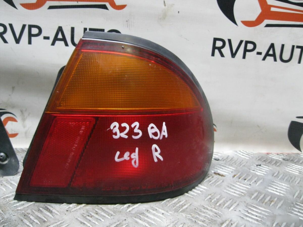Фонарь задний Mazda 323 BA 1994-1998 Седан 123123