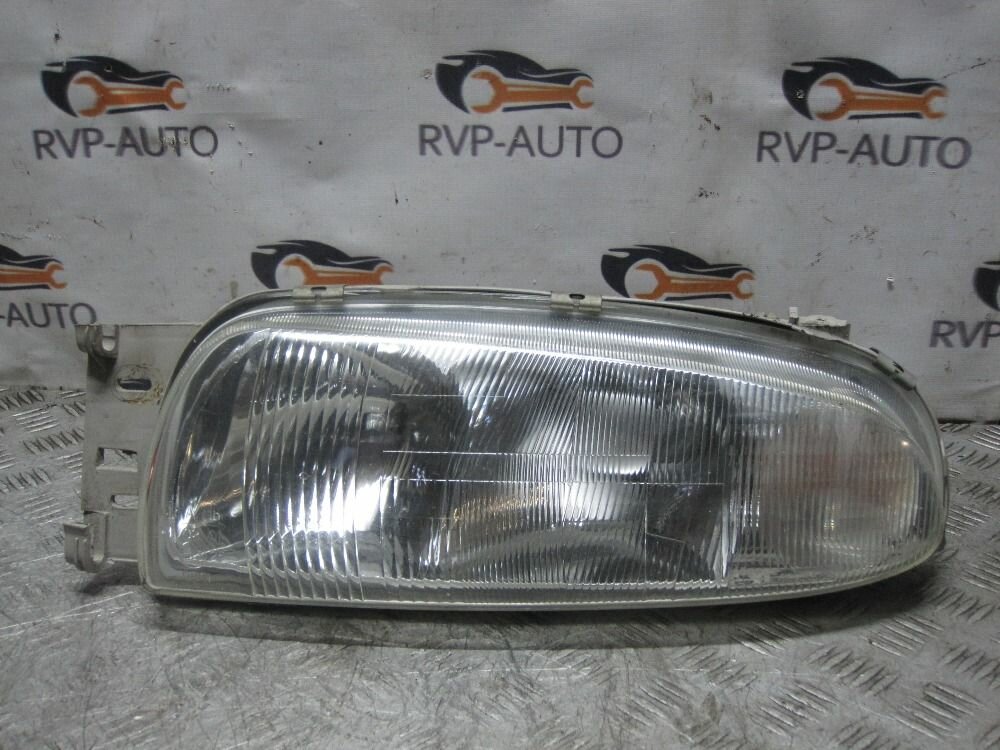 Фара левая Ford Fiesta 1995-2001 084311128
