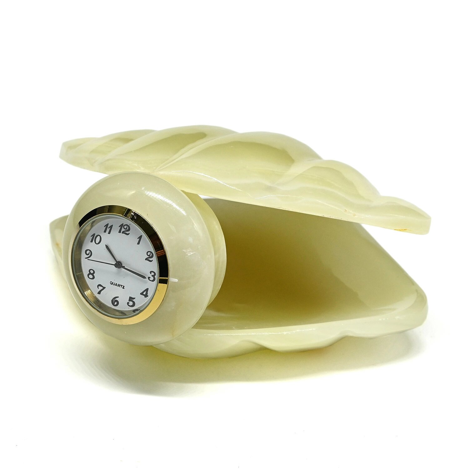 Часы в ракушке из камня оникс 130*130*65мм. .