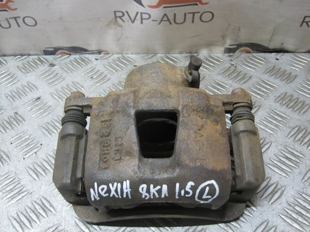Суппорт тормозной передний Daewoo Nexia 1.5 8кл.