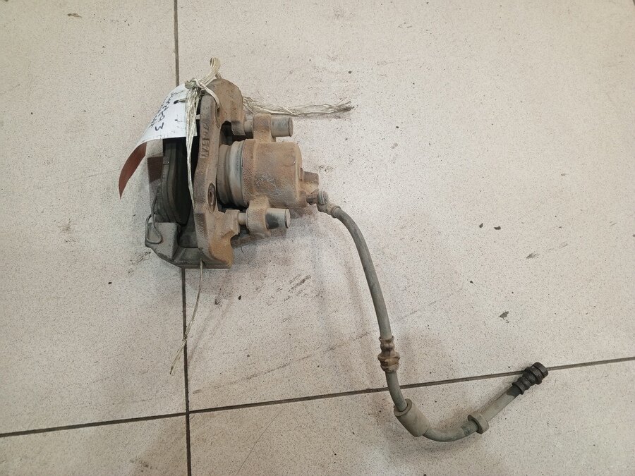 Суппорт передний правый от Mazda 3 bk 2003-2009