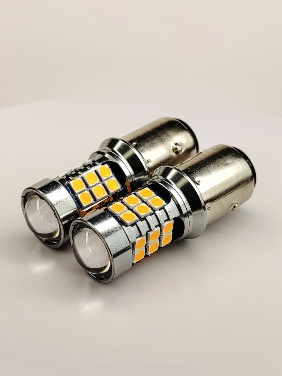 Яркие LED лампы с линзой 12V желтые P21/5W (BAY15D 1157) чипы 3030 27SMD, для легковых автомобилей, спецтехники, мотоциклов, квадроциклов, американских тягачей, 2шт
