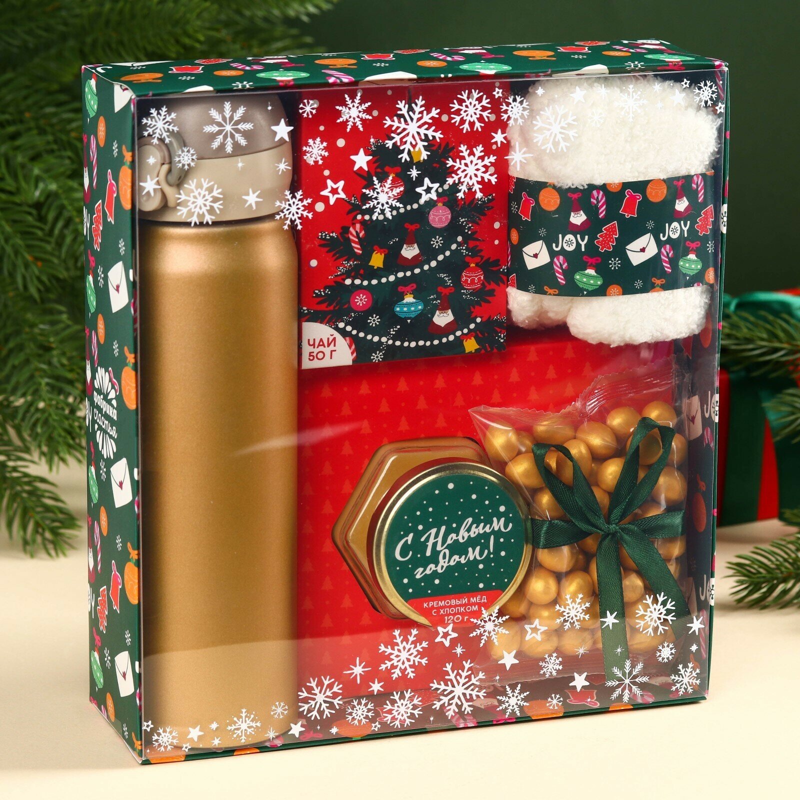 !09 Набор «Веселья в новом году»: чай со вкусом лесных ягод 50 г, крем-мед хлопковый 120 г, арахис в шоколадной глазури, 100 г, носки р-р: 36–39, термос 500 мл.