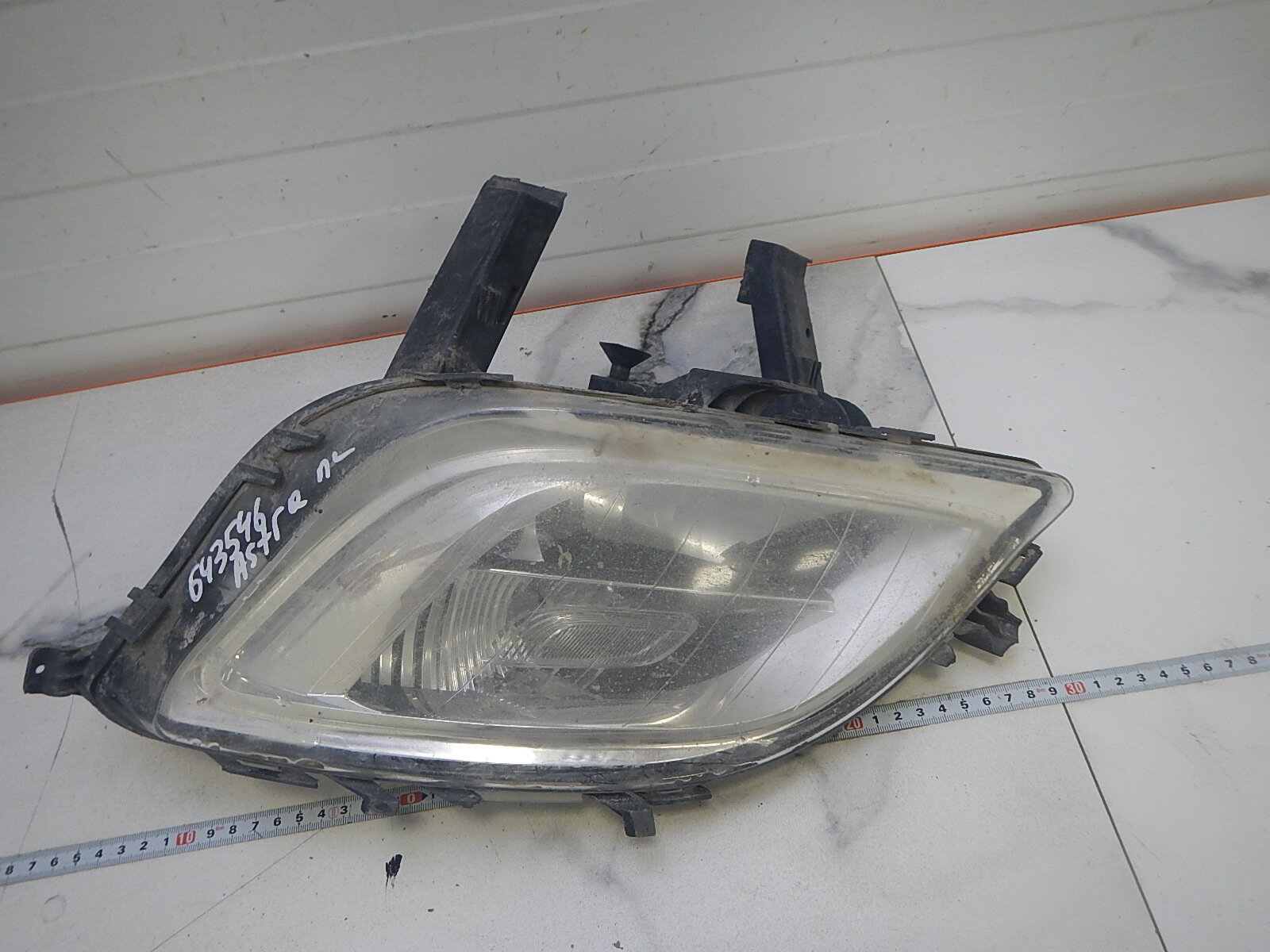 Б/У Фара противотуманная левая, Opel (Опель)-ASTRA J (09-) OPEL ASTRA J (09-) Царапины, грязь внутри, сломано 4 креплени...