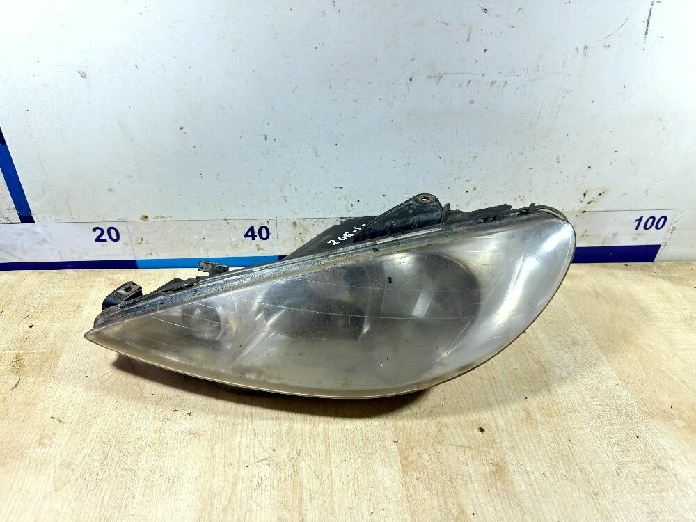 Фара левая Peugeot 206 9628666880