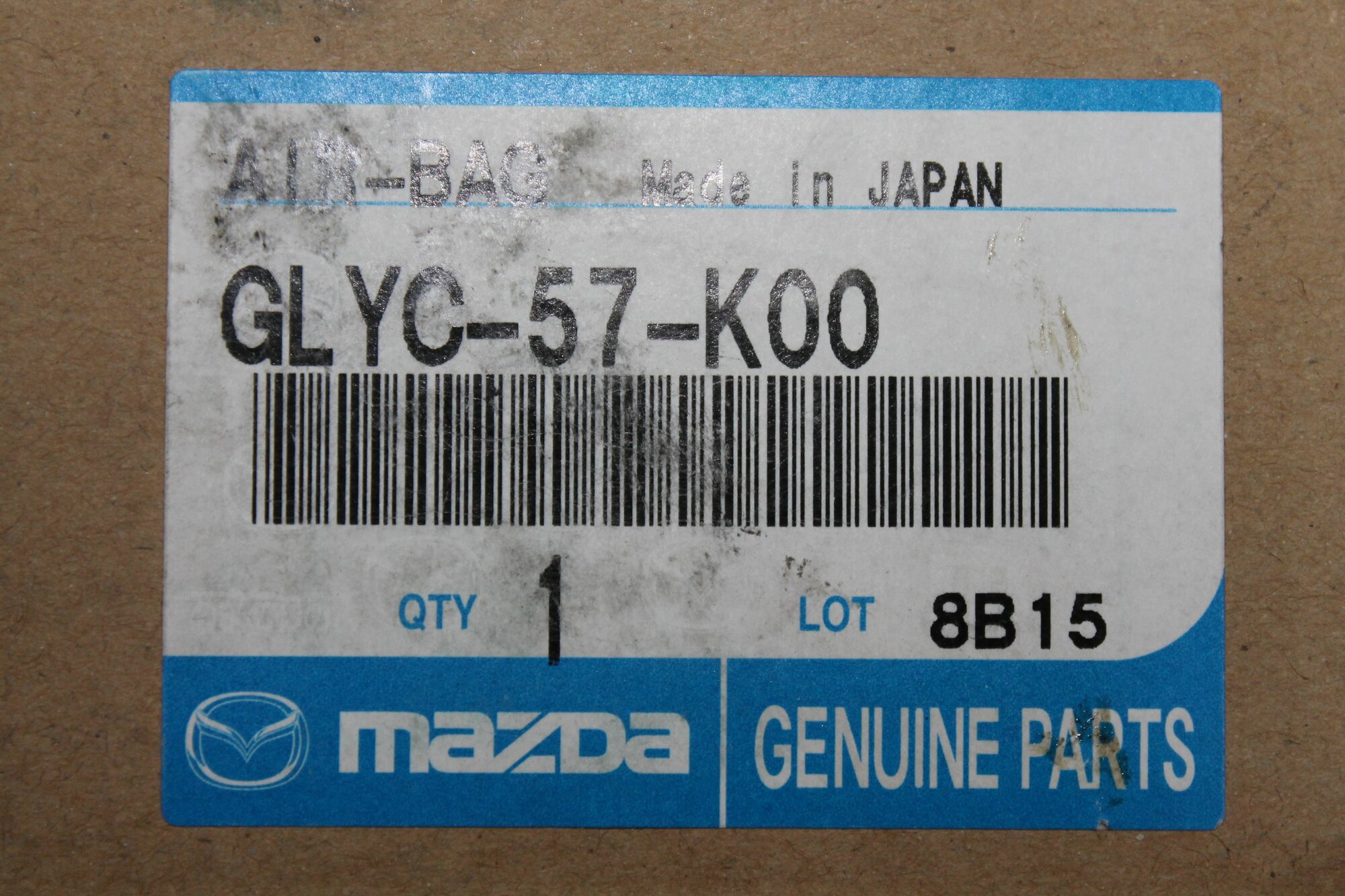 Подушка безопасности в рулевое колесо MAZDA GLYC57K00