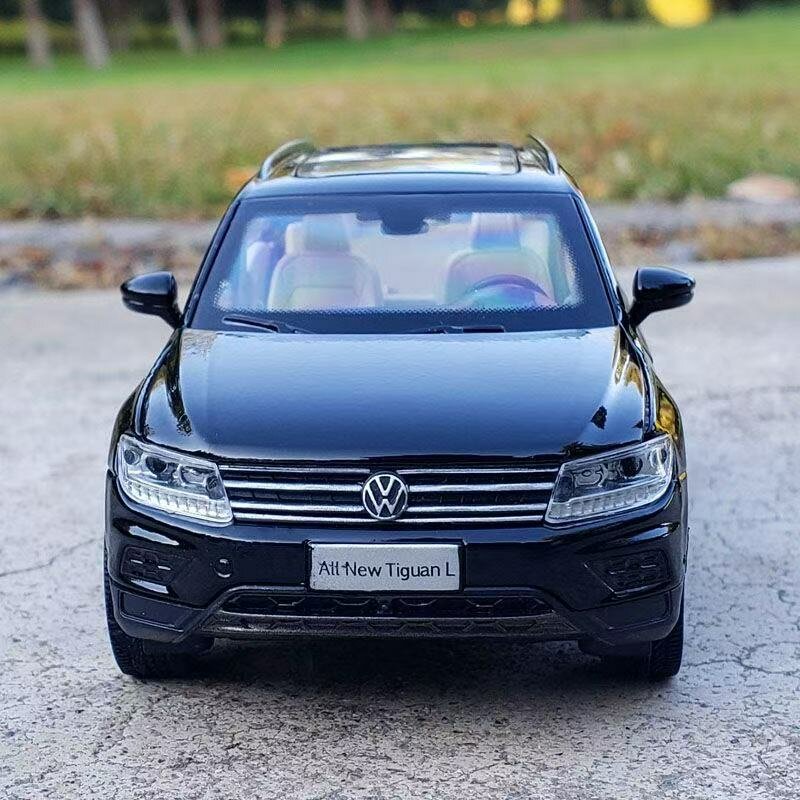 Вот подробное описание модели автомобиля Volkswagen Tiguan в масштабе 1:32 — фото 1