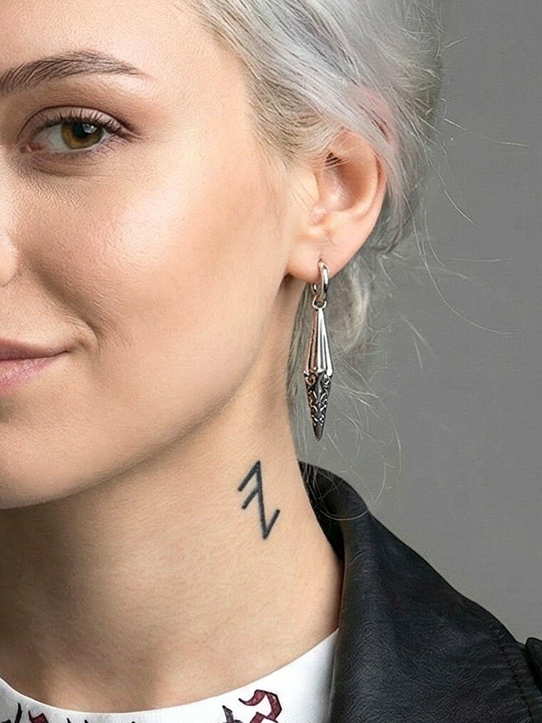 Моносерьга, славянский оберег