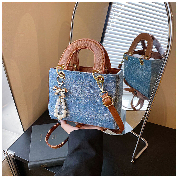 Женская джинсовая сумка для путешествий, новая модная нишевая сумка через плечо лета 2025 года, корейская версия с ощущением роскоши, сумка в стиле Lady Dior.