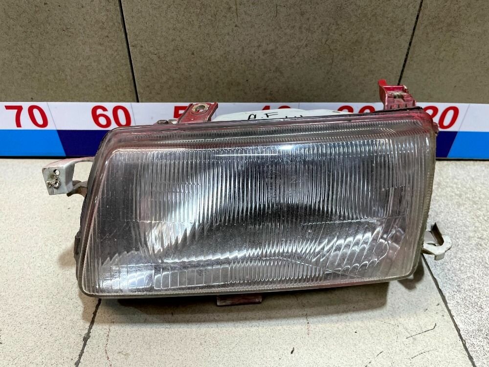 Фара левая Opel Astra F 4421106LLDE