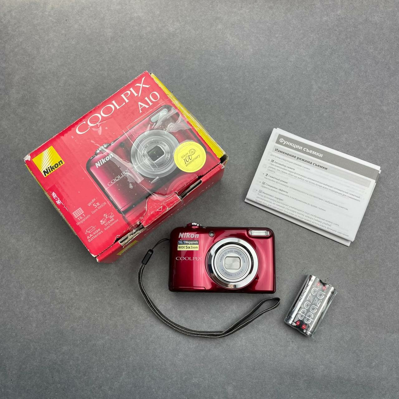 Цифровой компактный фотоаппарат Nikon Coolpix A10 красный, 16.1 Мп