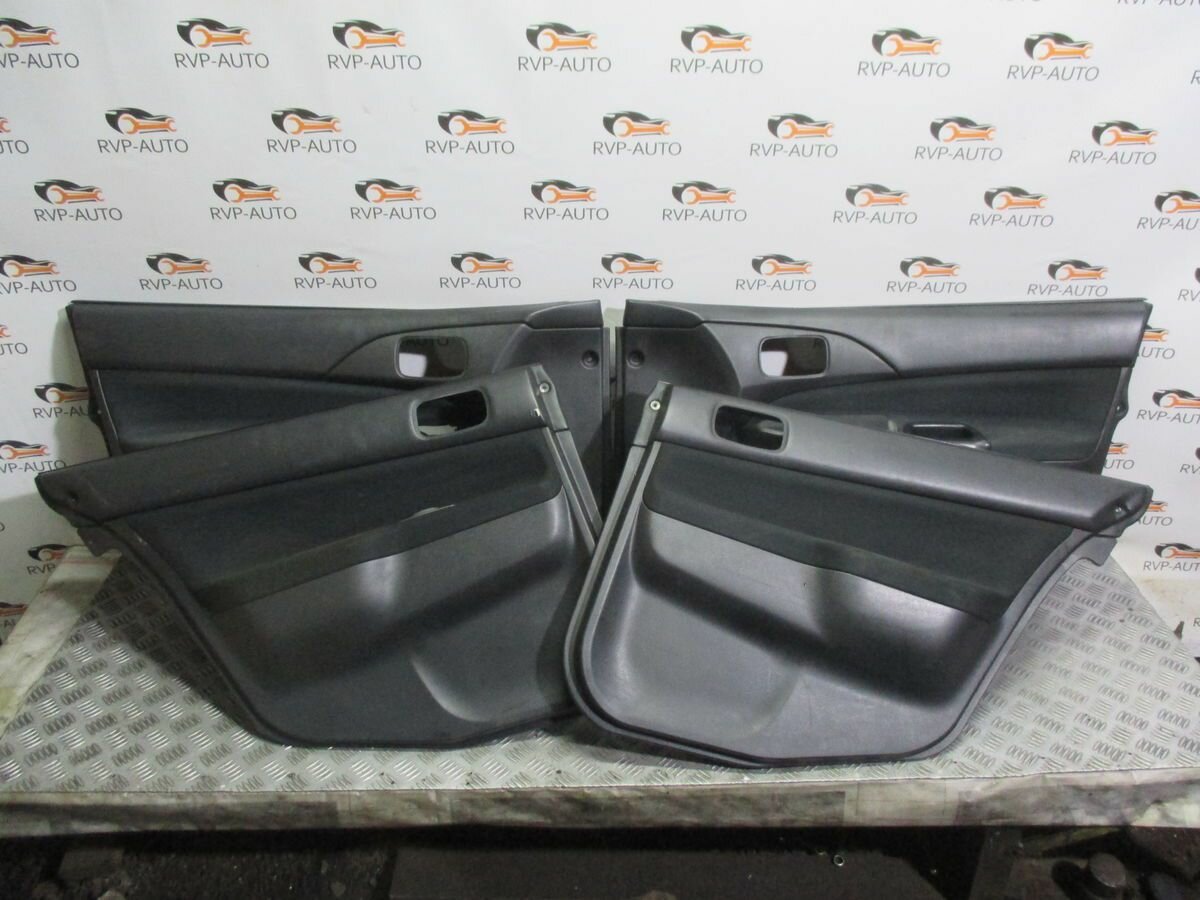 Обшивка двери к-кт Mitsubishi Lancer 9 2003-2008 MR444242