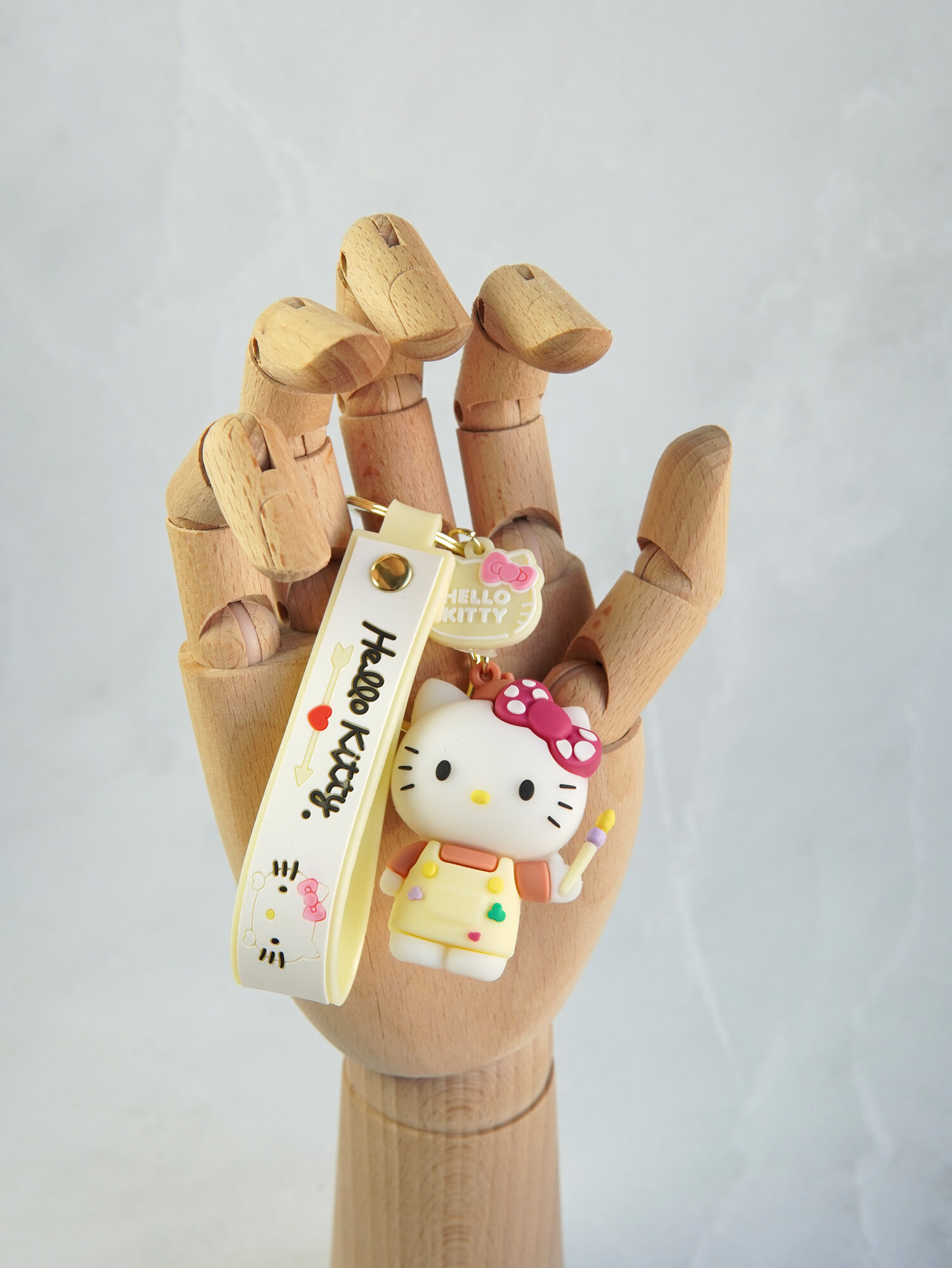 Брелок Hello Kitty в желтом костюме с кисточкой, 5 см | Яркий образ | Желтая палитра