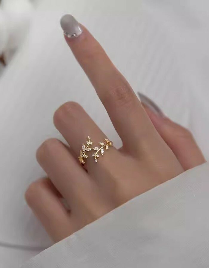 Кольцо переплетенное, циркон