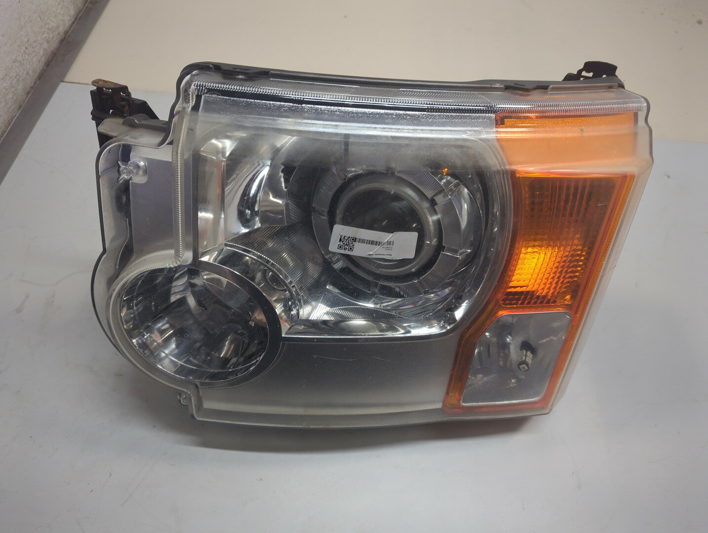 Фара (передняя) левая Land Rover Discovery 3 Б/У