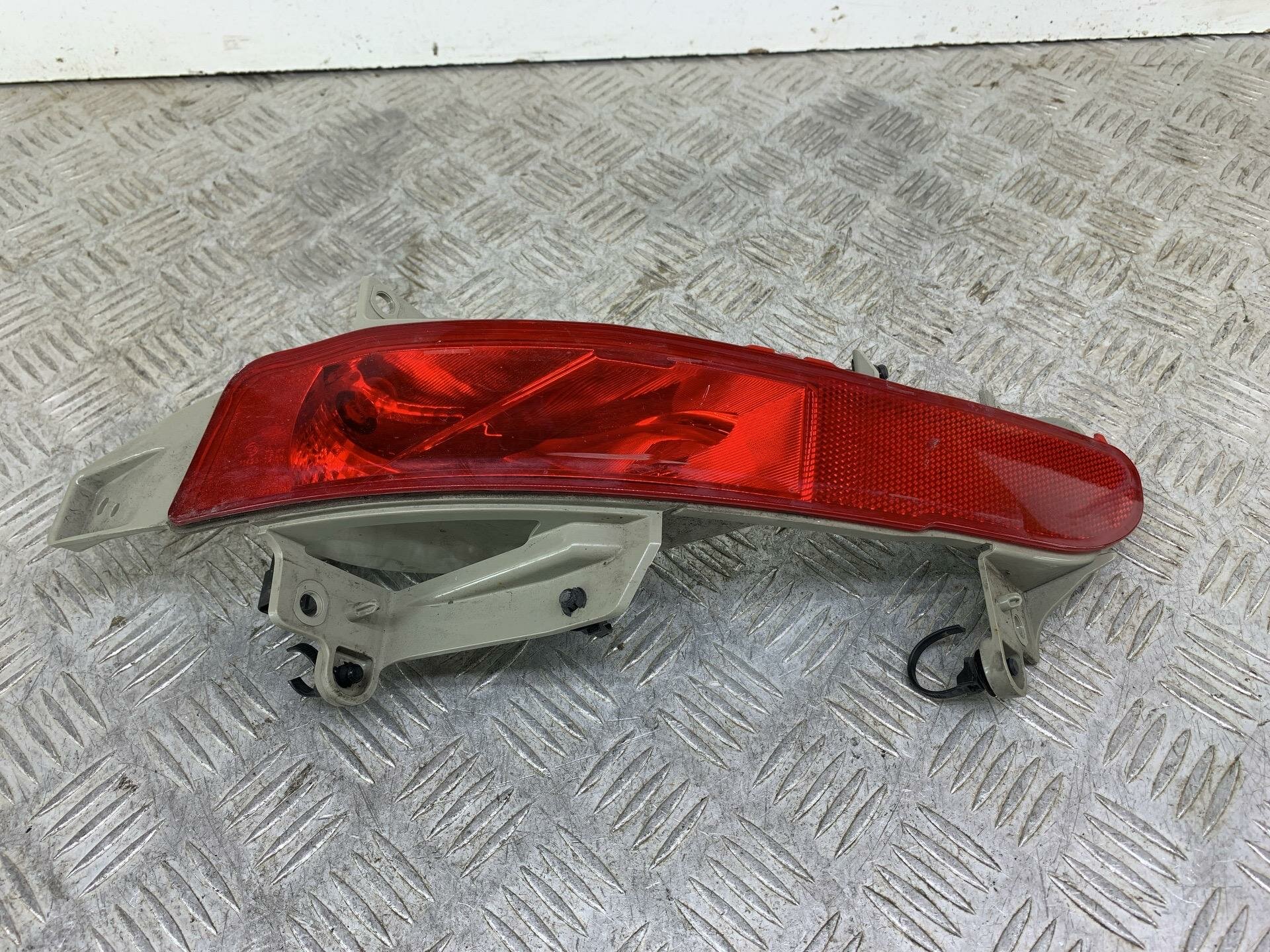 Фонарь противотуманный левый Ford Galaxy 3 рест. 2022 EM2B15K273AC