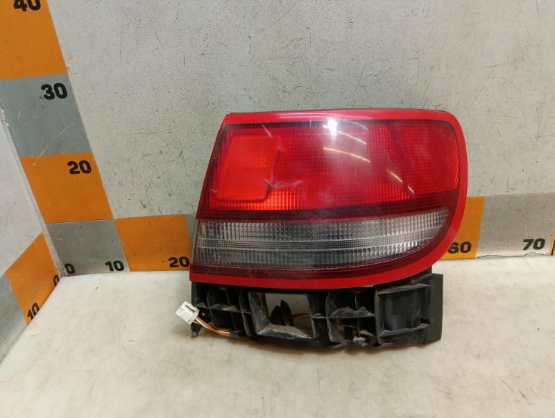 Б/У дефект, наружный, оригинал Фонарь задний правый Toyota Carina E 1995 AT190 462731 TOYOTA арт. 8155005020