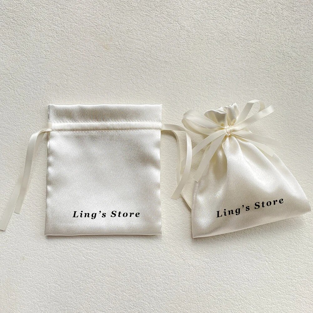 Атласные сумки 100 шт.