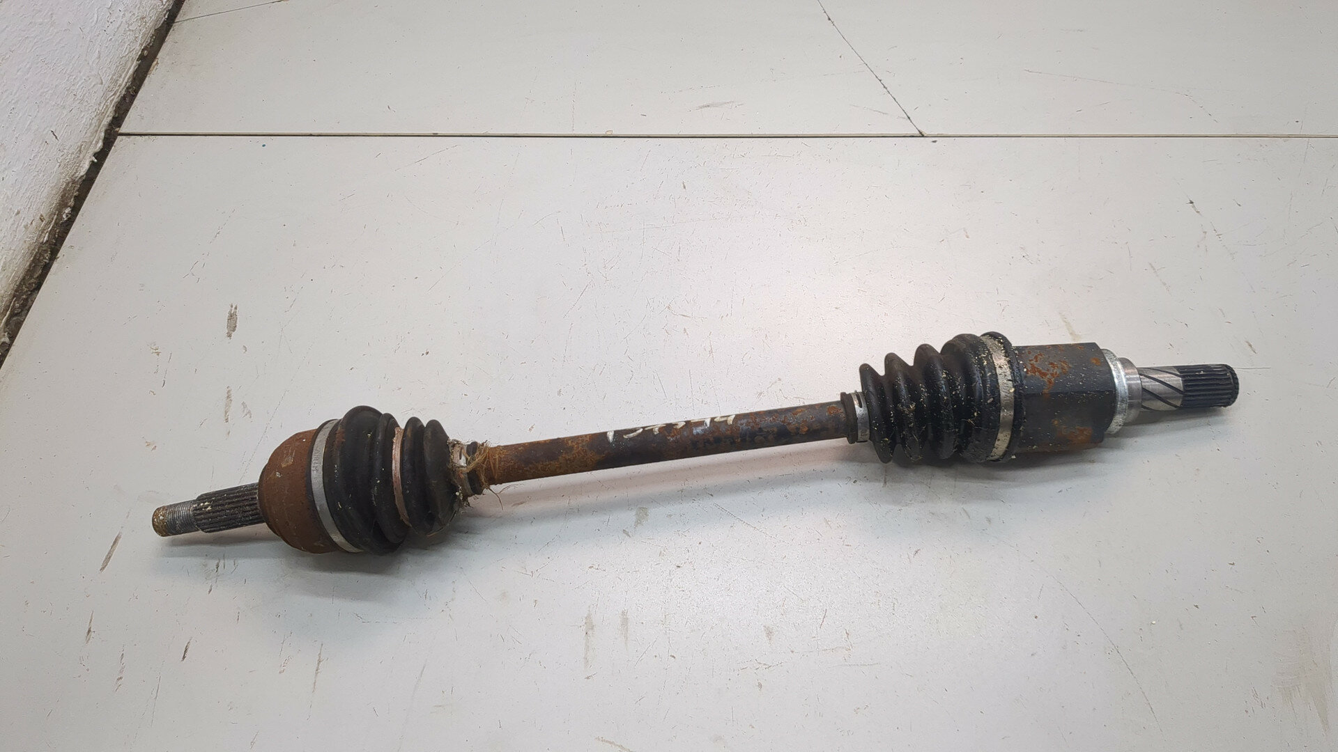 Полуось (вал, шрус) левая передняя Nissan Note E11 Б/У