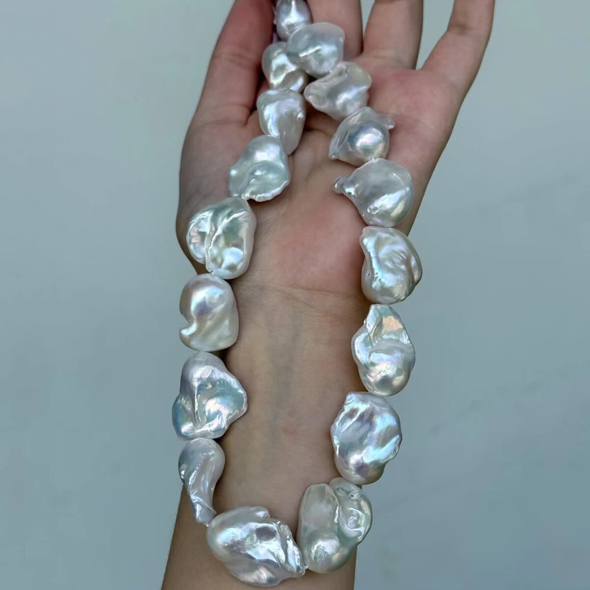 Натуральный пресноводный жемчуг барокко рыбий хвост 20-25 мм