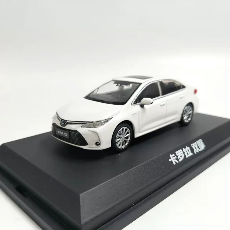 Модель автомобиля Toyota Corolla Hybrid Welly 1:43, цвет A