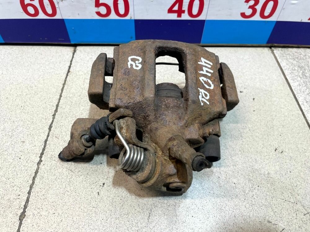 Суппорт задний левый Volvo 440 9031509