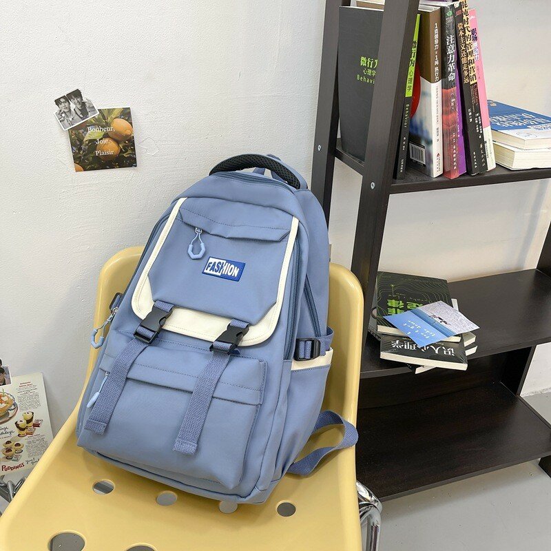 Color blocked letter decoration large capacity student backpack for education and travel