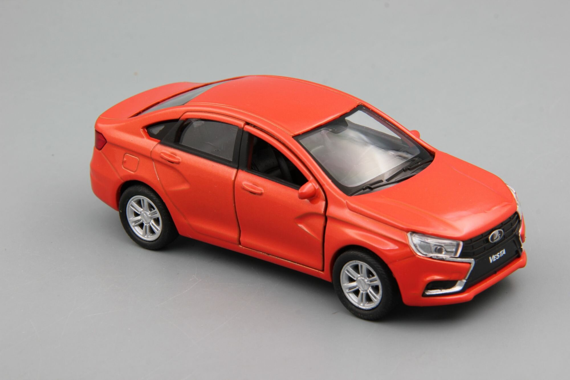 Mодель машины 1:38 LADA Vesta пруж. мех, оранж WELLY