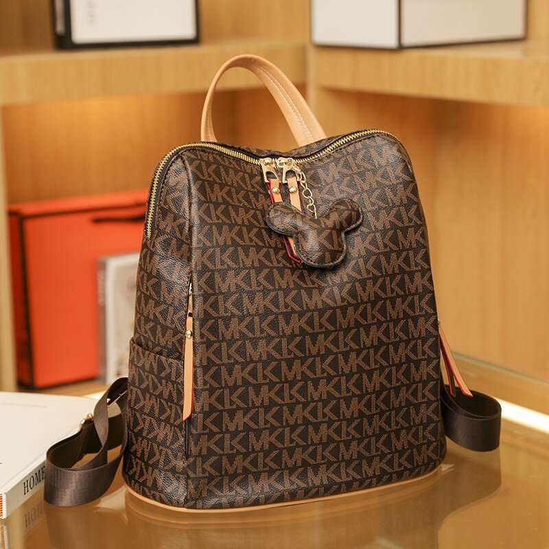 20262023 Кросс-бодерный рюкзак из PU для женщин, большой вместимости, европейский и американский стиль, модный печатный школьный рюкзак, кожаная популярная дорожная сумка