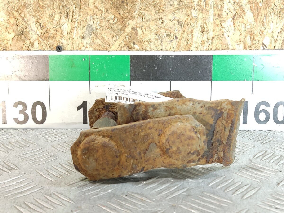 Кронштейн MITSUBISHI L200 КВ MN103209