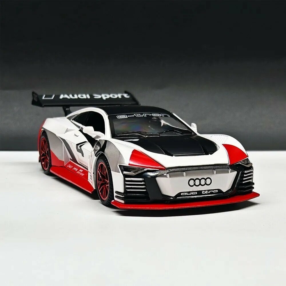 Машинка Audi GT E-TRON Vision. Металлическая модель автомобиля Ауди Етрон Гранд Туризмо Вижн 17см. белый. Инерционная игрушка машина 1:32