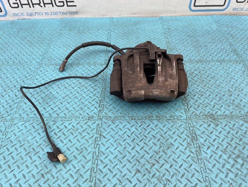Суппорт Mercedes-Benz E-Class W211 OEM A0034200183