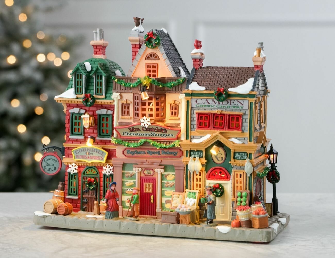 Домик рождественских магазинчиков миссис Кретчит, полистоун, подсветка, 24х22 см, LEMAX 55314-lemax