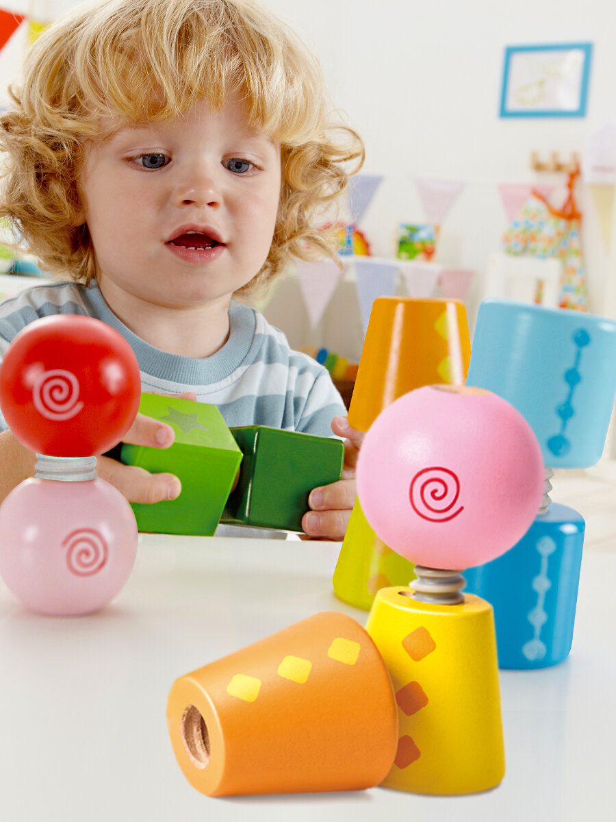 Игрушка Развивающая Hape деревянные закручивающиеся кубики E0416_HP