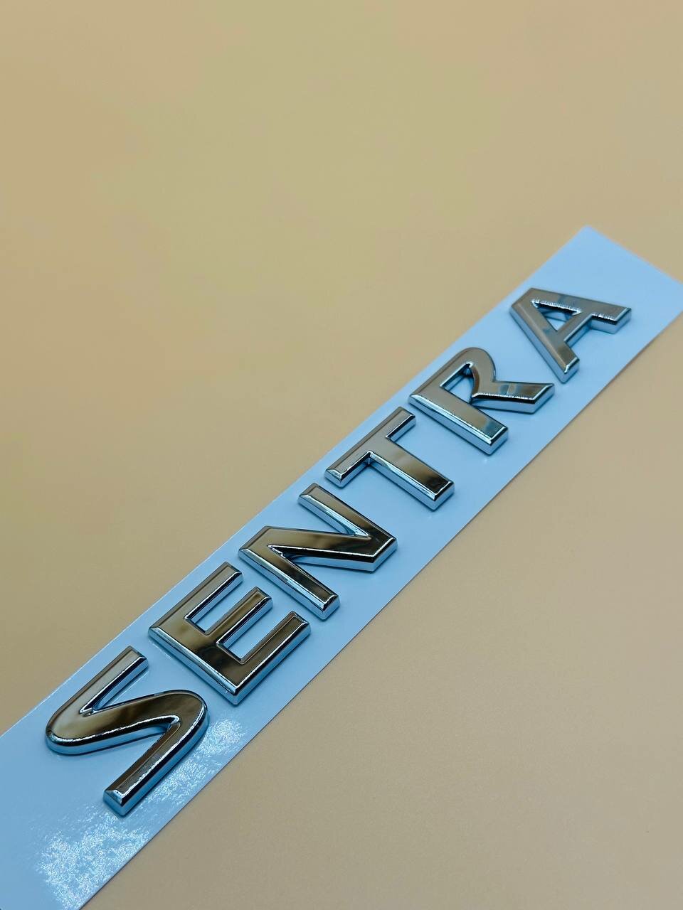 Шильдик Наклейка на багажник Nissan Sentra Хром 20см