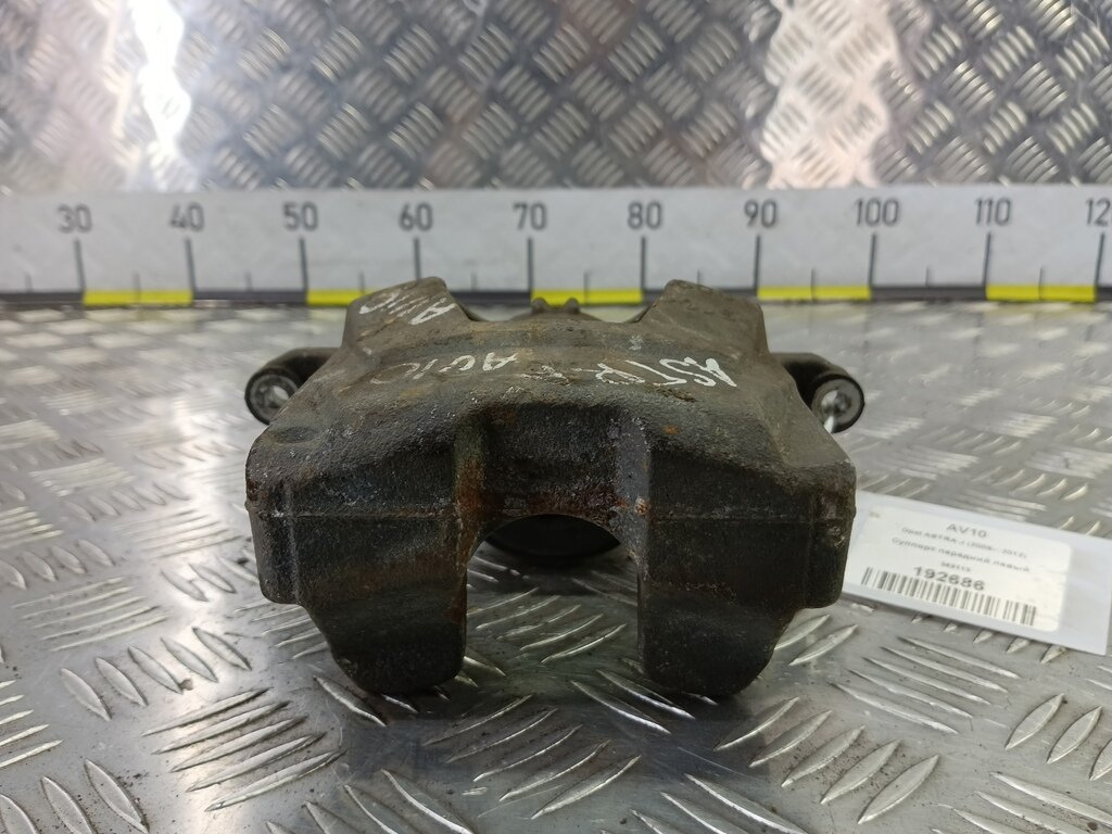 Суппорт передний левый Б/У для Opel ASTRA J (2009—2012) 542113