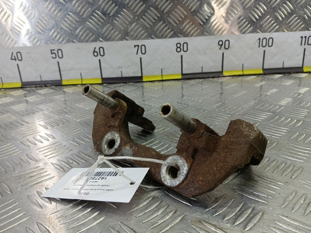 Скоба суппорта передняя Б/У для FORD Focus III рестайлинг (2014—2019) 1695010