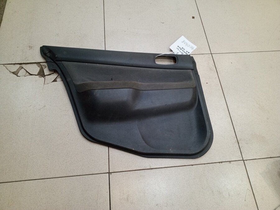Обшивка двери задней левой от Mitsubishi Lancer 9 CS 2000-2008