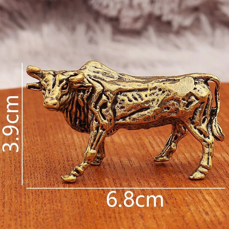 Статуэтка Орнамент в виде буйвола весит примерно 128 граммов, высота 3.89 см, длина 6.8 см