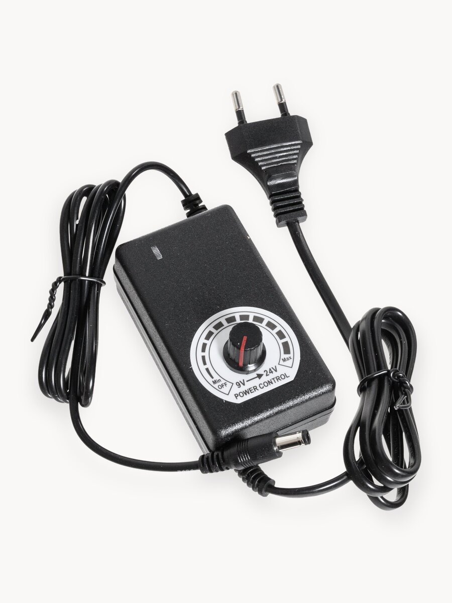 Универсальный блок питания с регулировкой выходного напряжения в диапазоне 9-24V постоянного тока - 1A , 5.5x2.5 , 24W