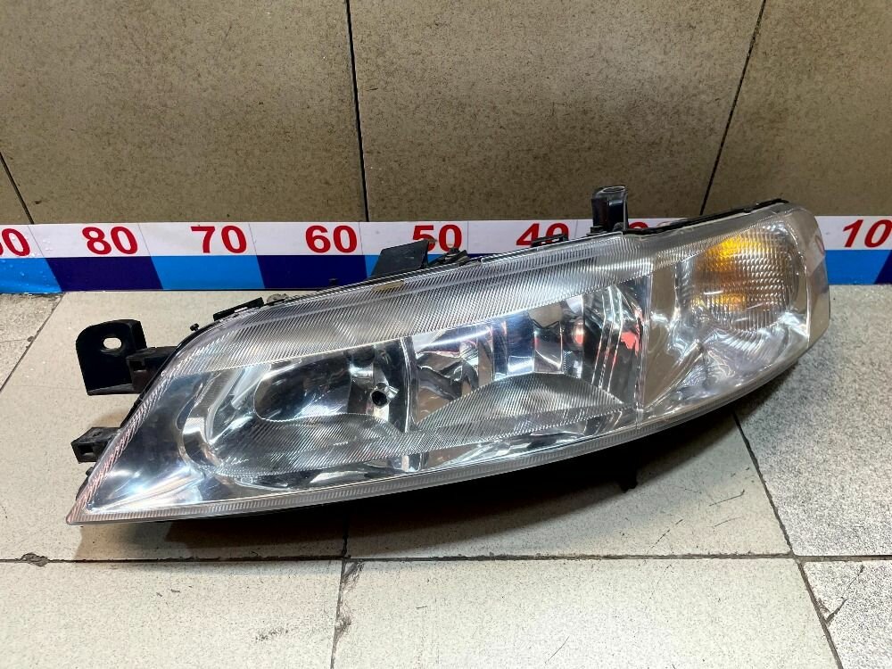 Фара левая Opel Vectra B 205750A82B