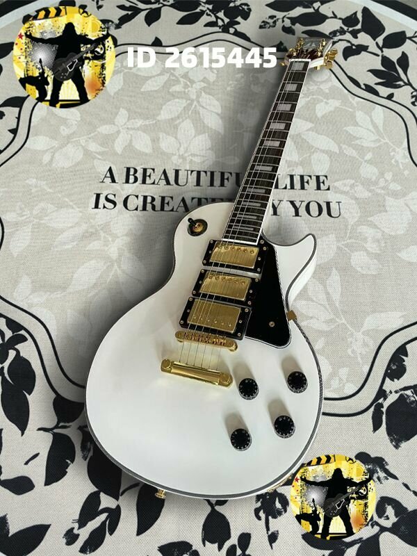 Электрогитара Gibson Les Paul с 6 струнами, длина корпуса 39 дюймов.