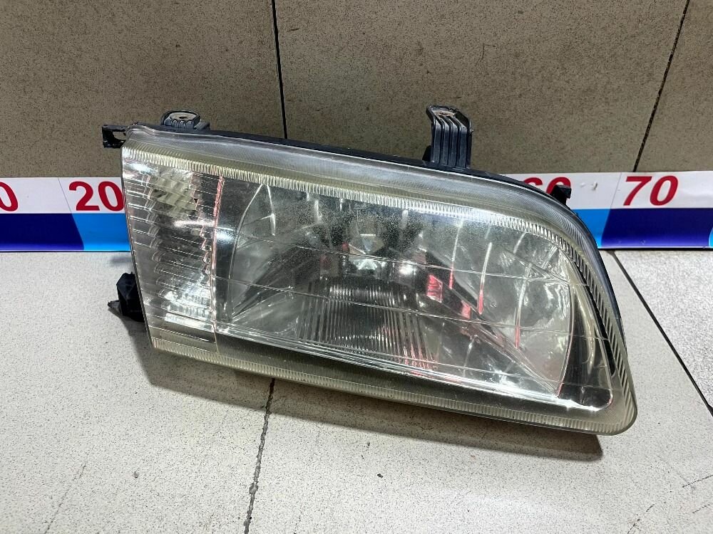 Фара правая Nissan Sunny B15 260104M429