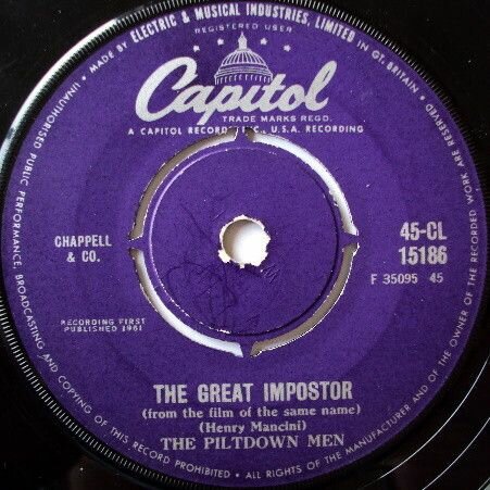 Пластинка The Piltdown Men "The Great Impostor" 7" (Single/UK/1961) VG/VG