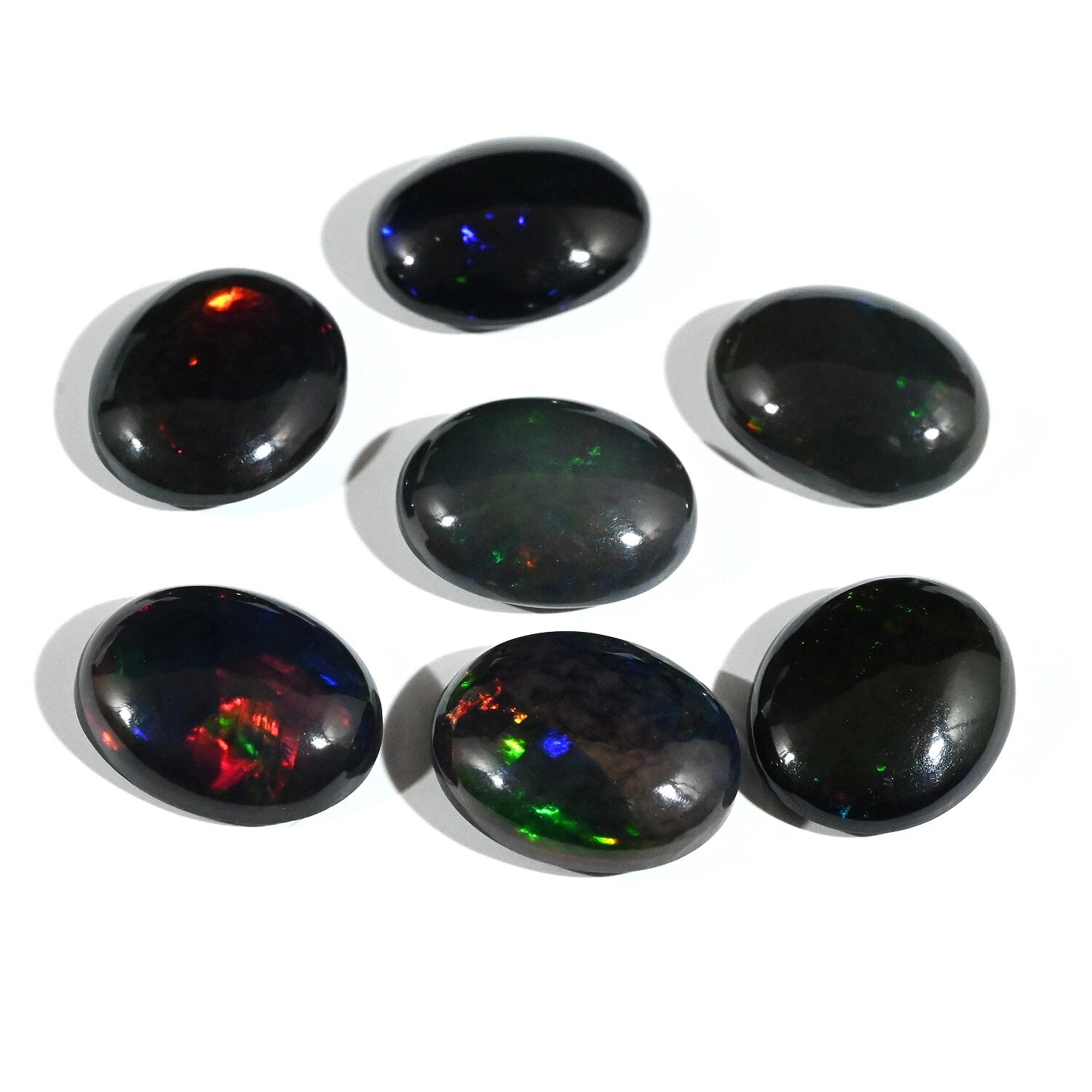 Кабошон из опала черного овал 10*12мм